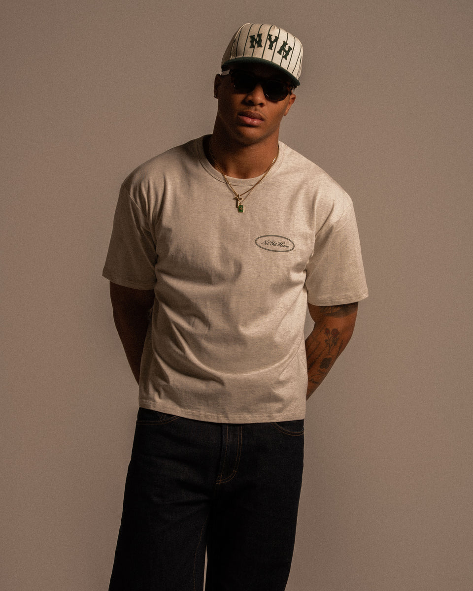 'OVAL LOGO' TEE - HEATHER – NOT YET HOME